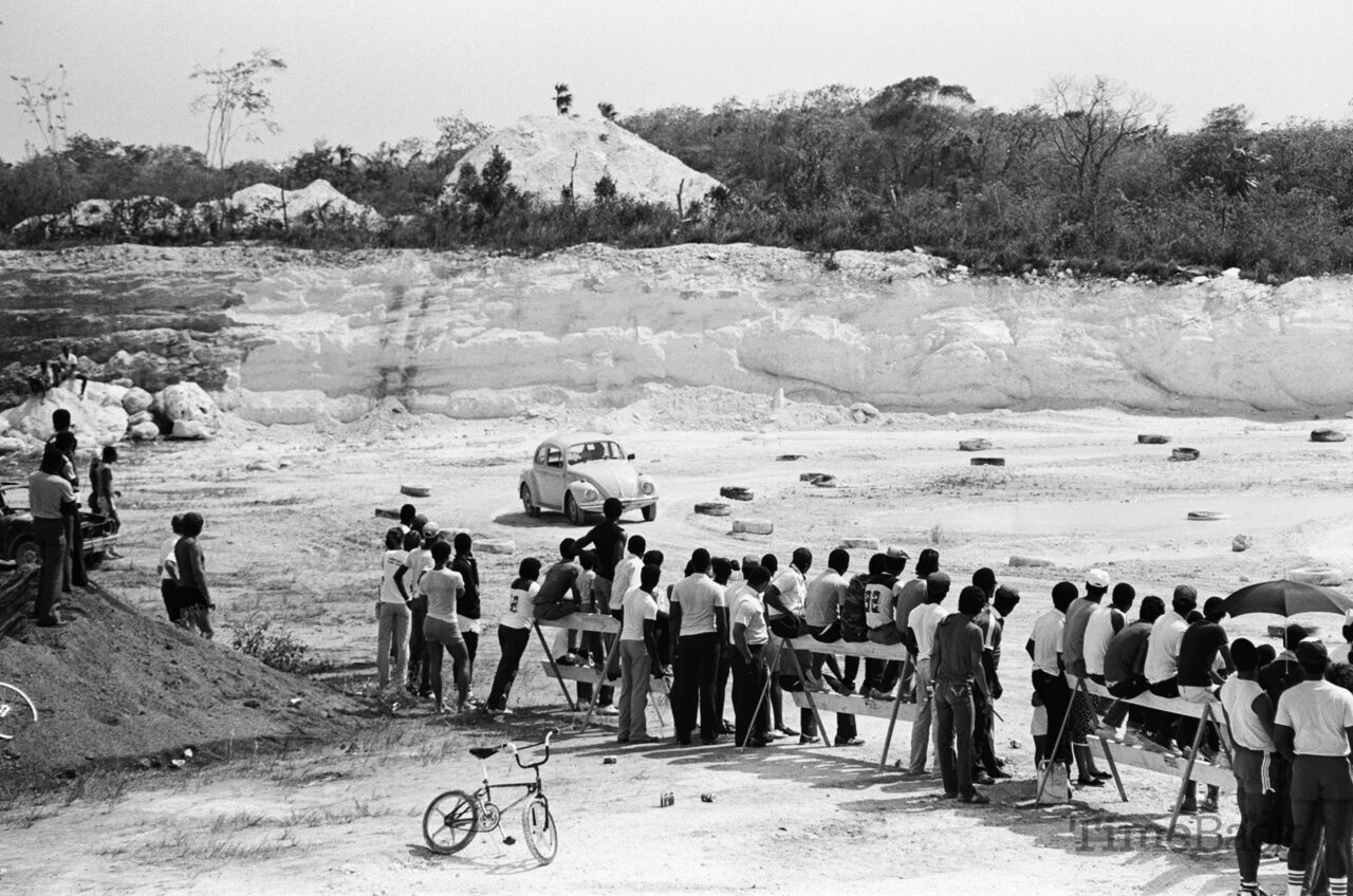 Car racing behind Triple C | TimeBack