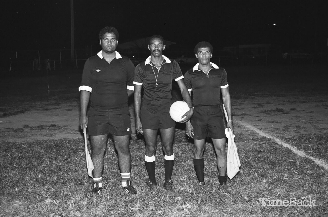 Football referees pose for a photo | TimeBack